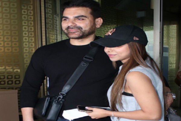 अरबाज खान पत्‍नी शूरा खान के साथ मुंबई एयरपोर्ट पर उनका हाथ थामे आए नजर ...